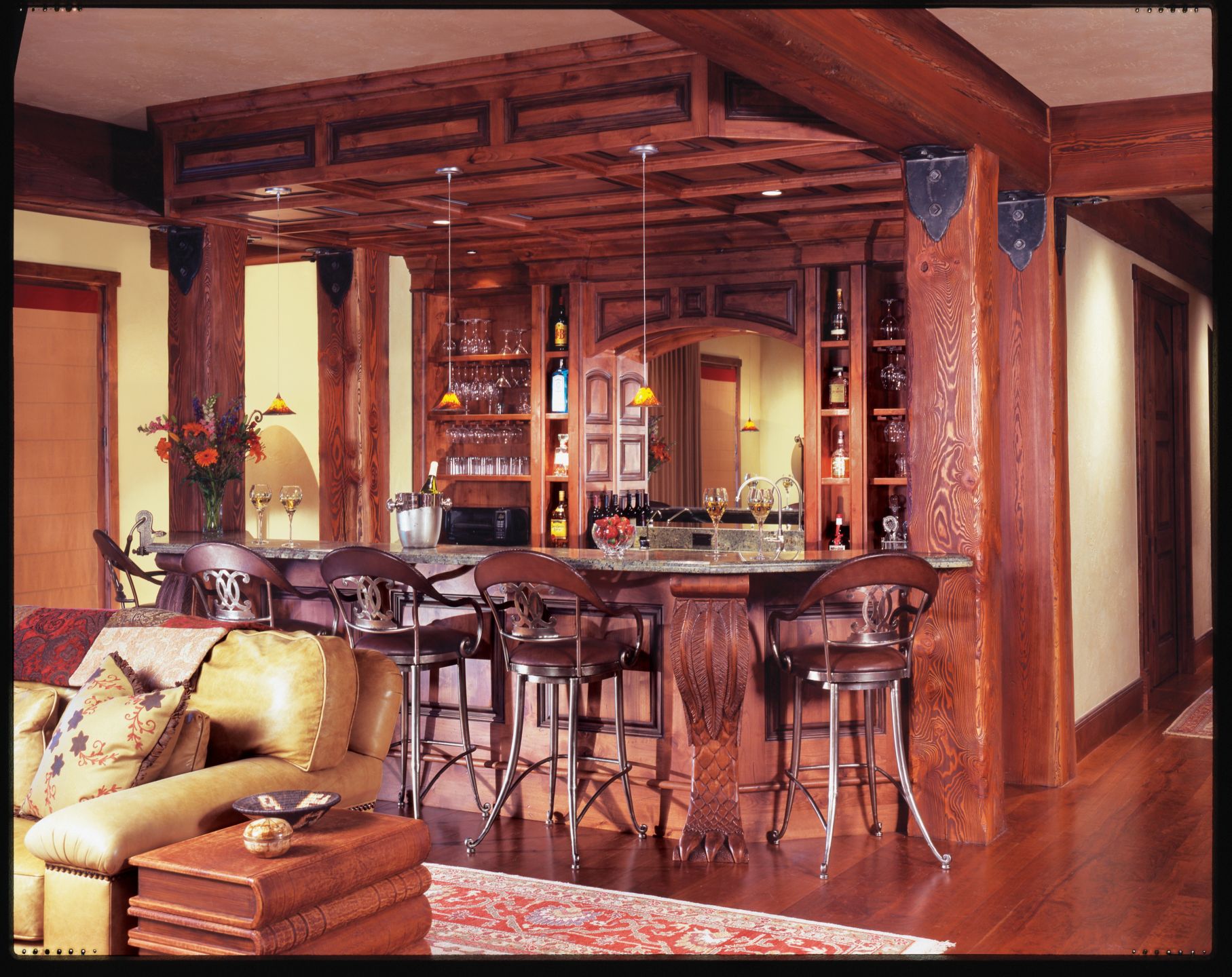 Hand-Carved Wooden Bar Area - Luxe Interiors + Design