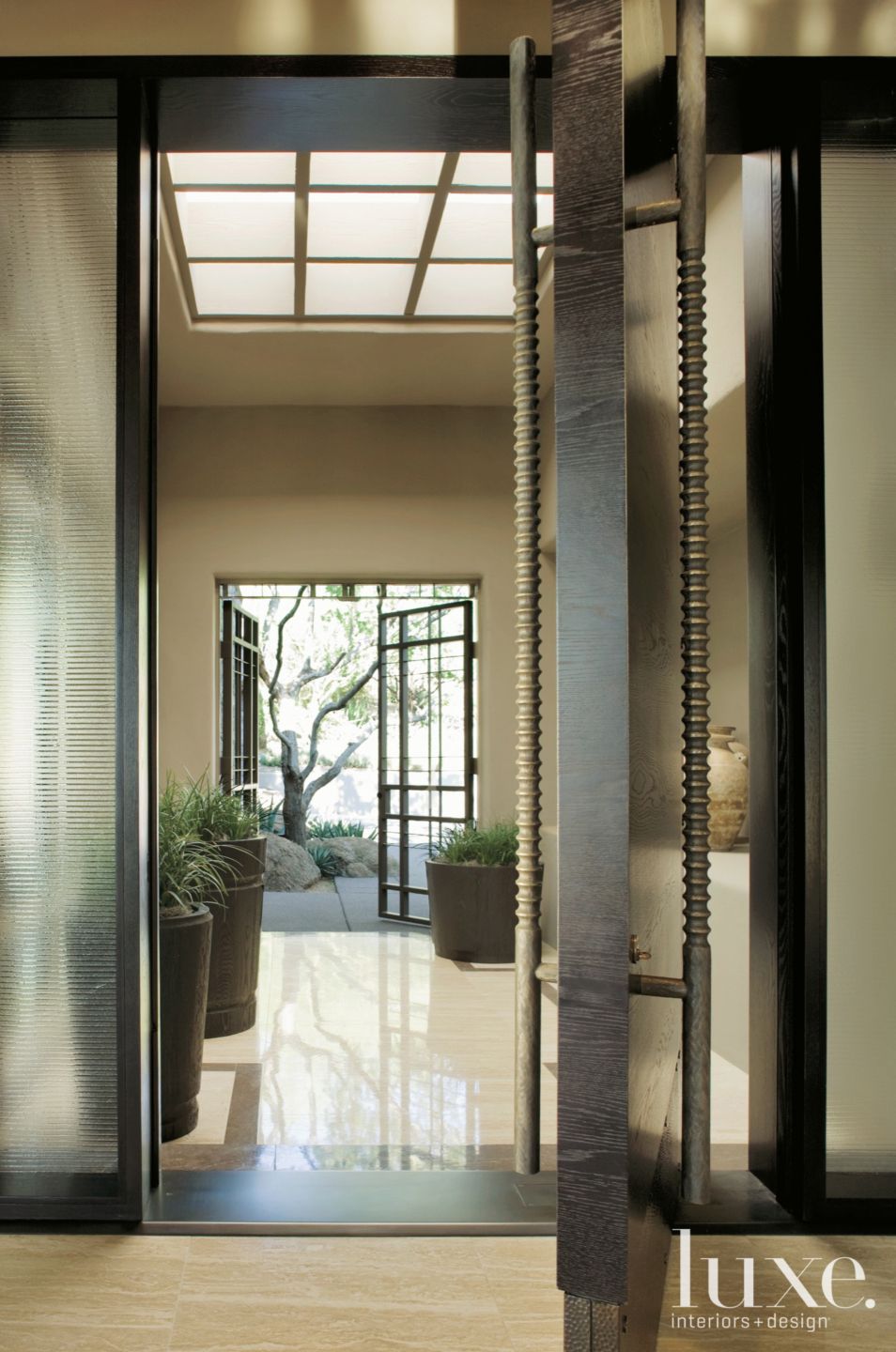 A Steel and Glass Entry - Luxe Interiors + Design