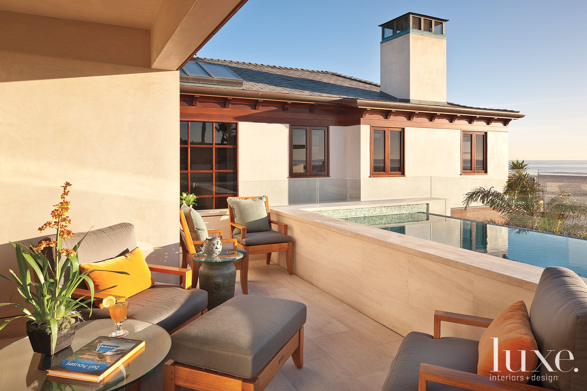 Contemporary Neutral Spa Area with Glass Railings - Luxe Interiors + Design