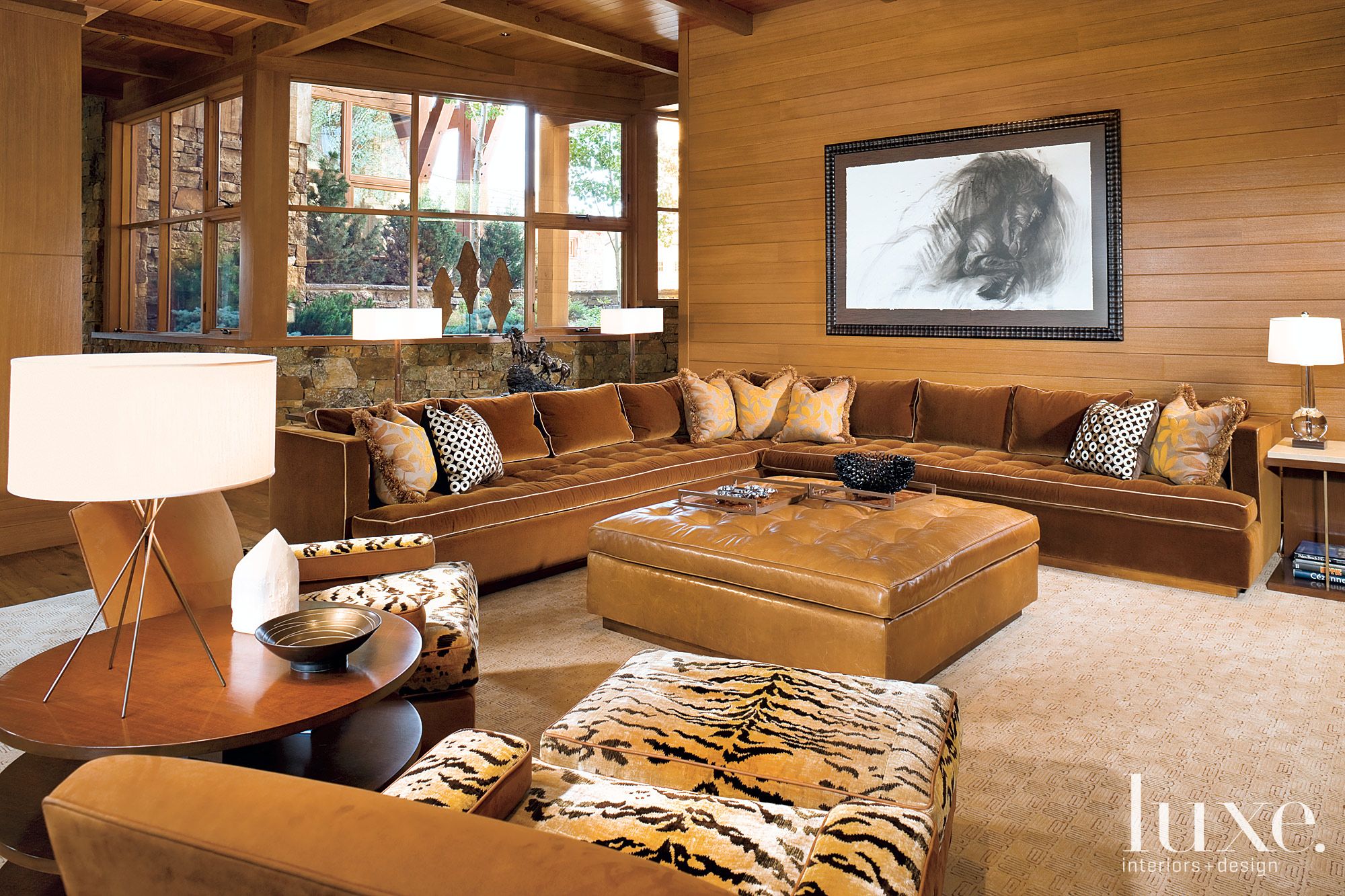 Mountain Brown Family Room with Tiger-Print Chair - Luxe Interiors + Design