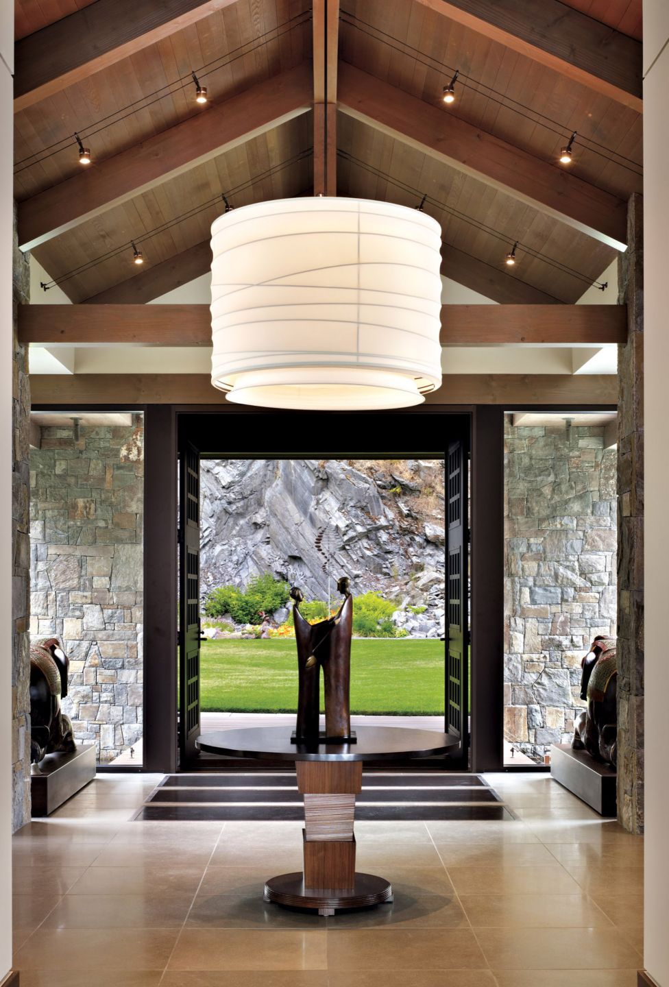 Worldly Mountain Foyer - Luxe Interiors + Design