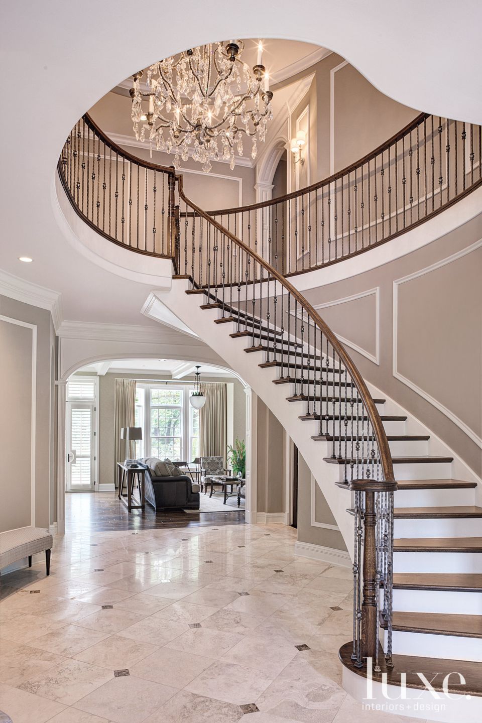 Oak and Wrought Iron Foyer Staircase Luxe Interiors Design