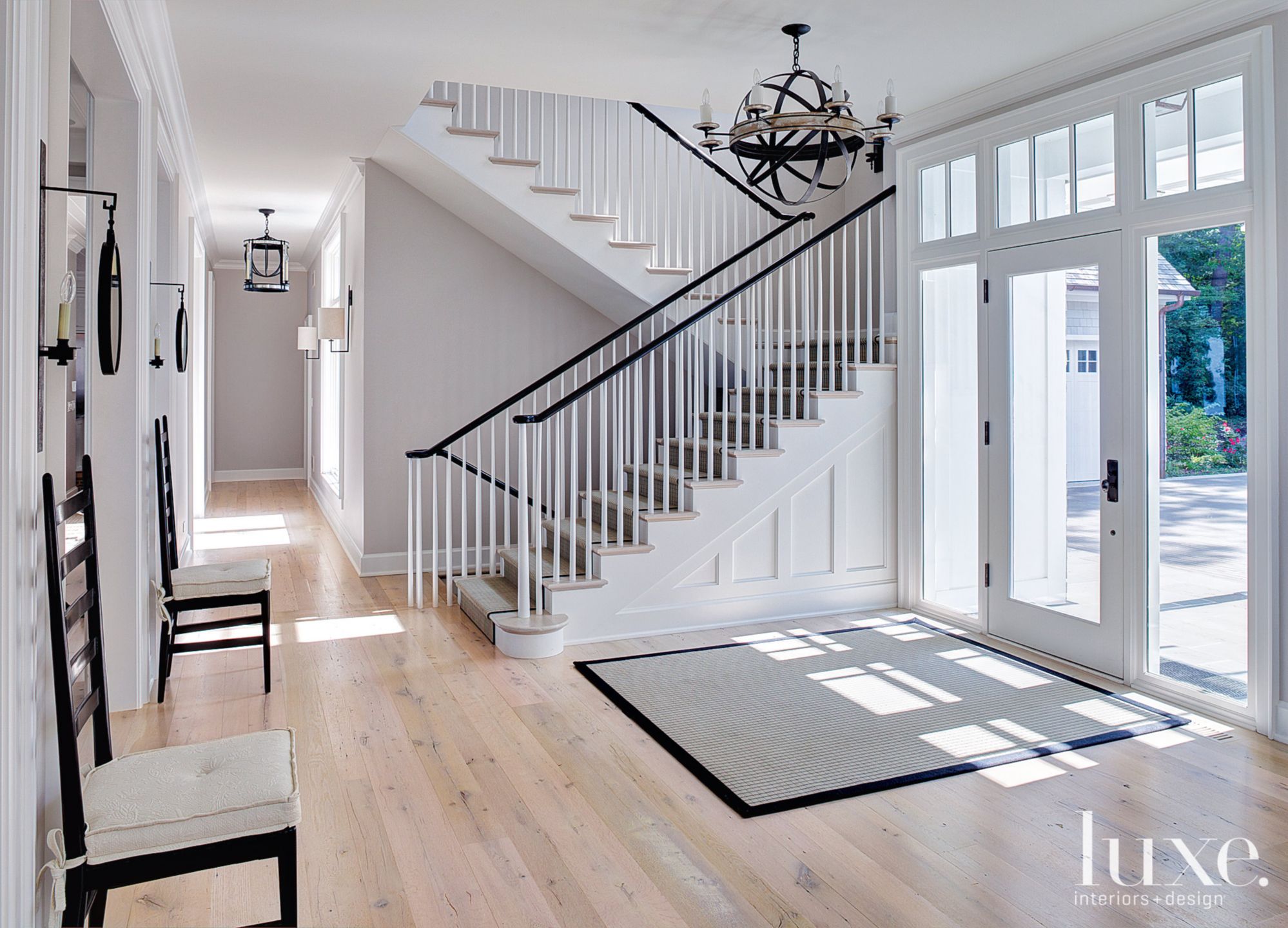 Contemporary White Foyer and Staircase - Luxe Interiors + Design