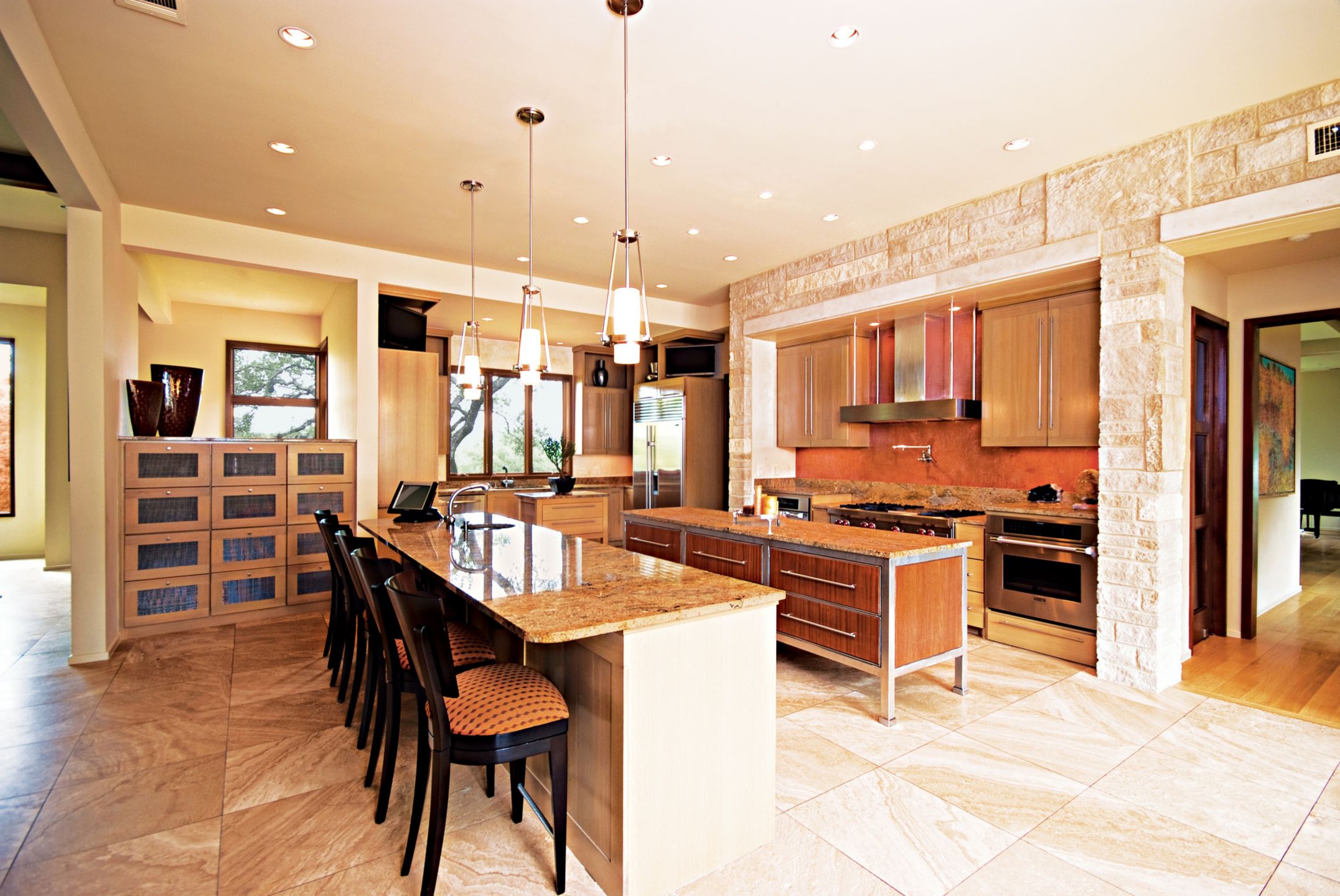 Contemporary Brown Kitchen with Orange Highlights - Luxe Interiors + Design
