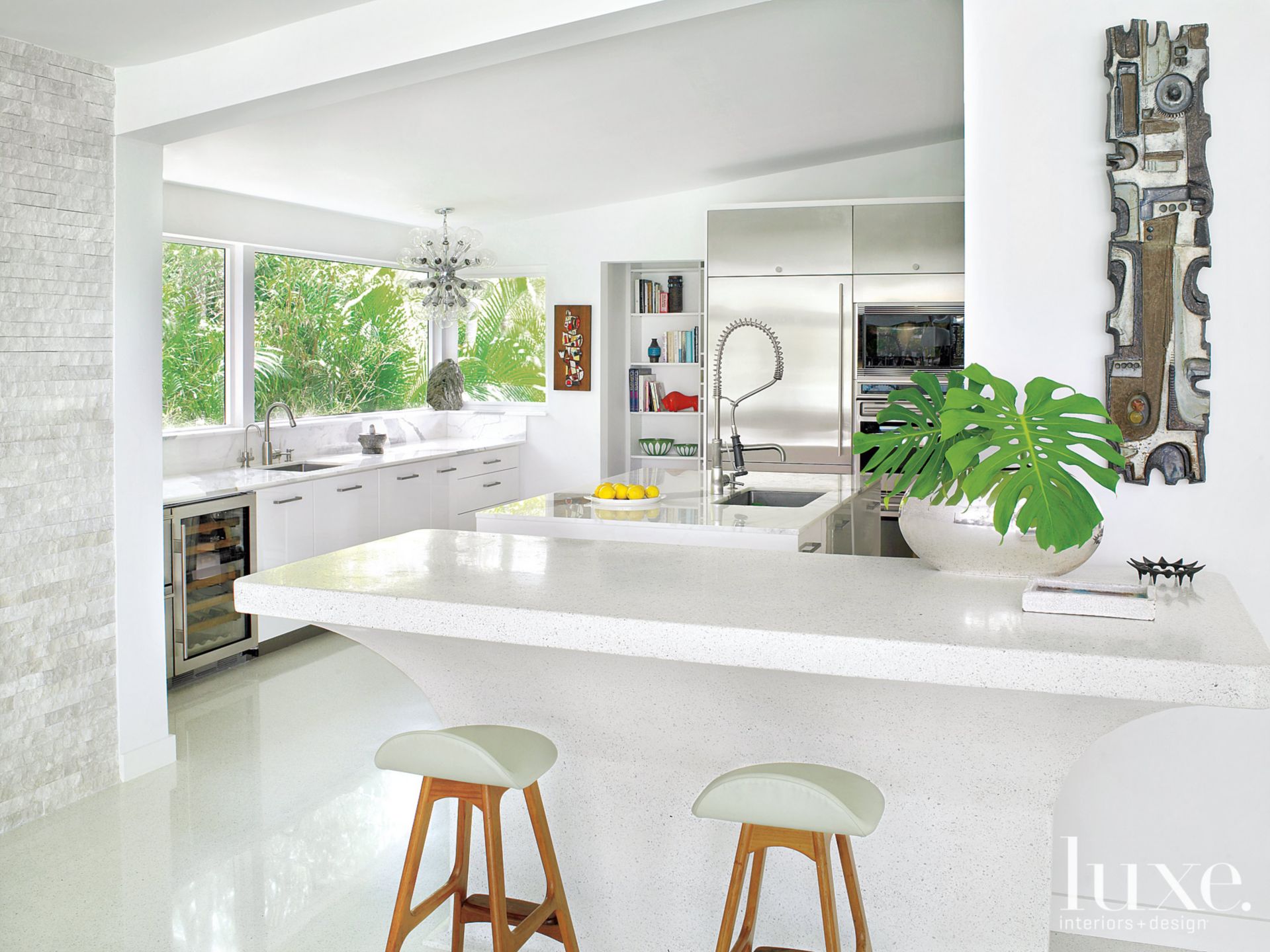 White lacquer cabinetry in kitchen - Luxe Interiors + Design