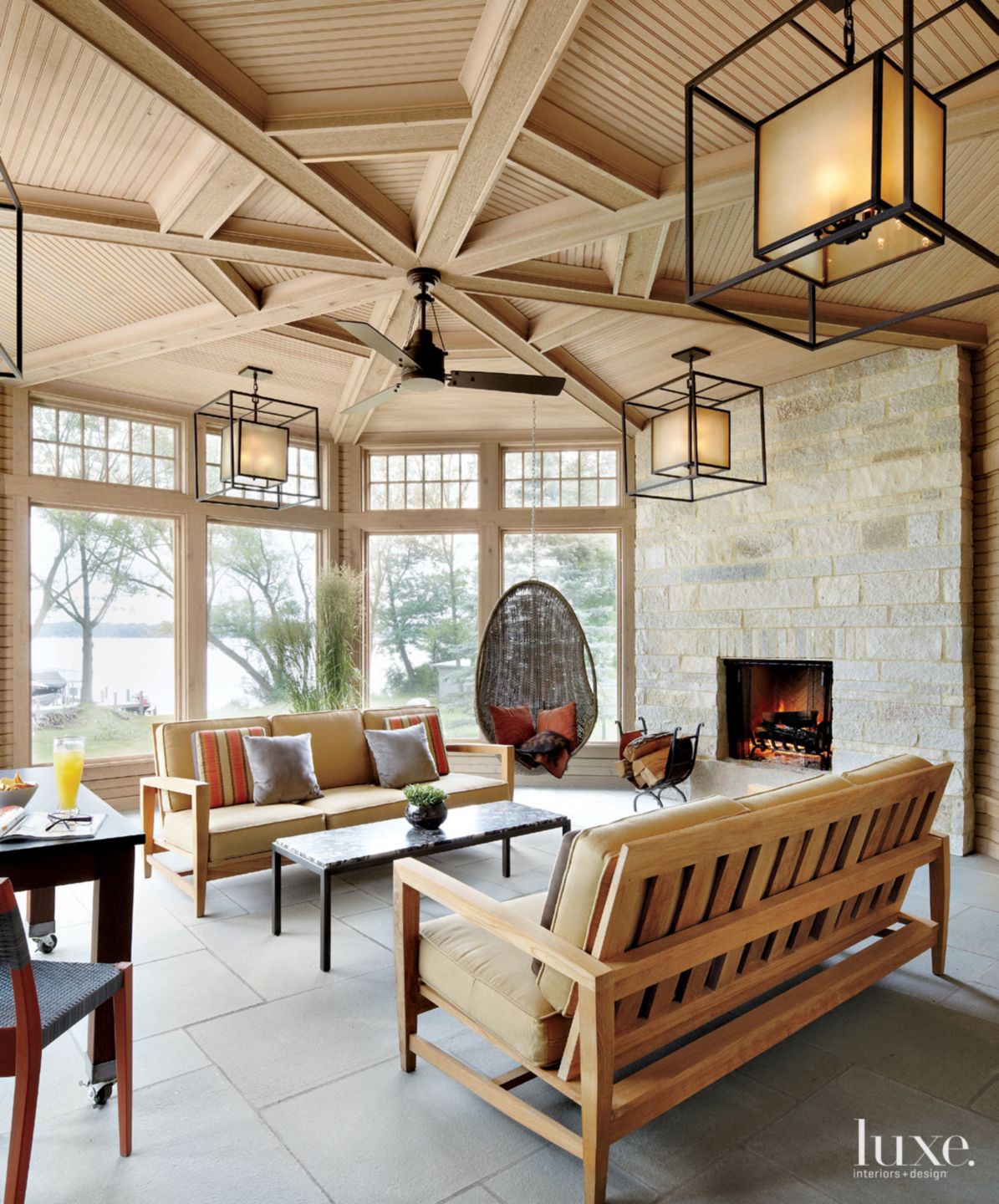 Contemporary Neutral Screened Porch with Fireplace - Luxe Interiors ...
