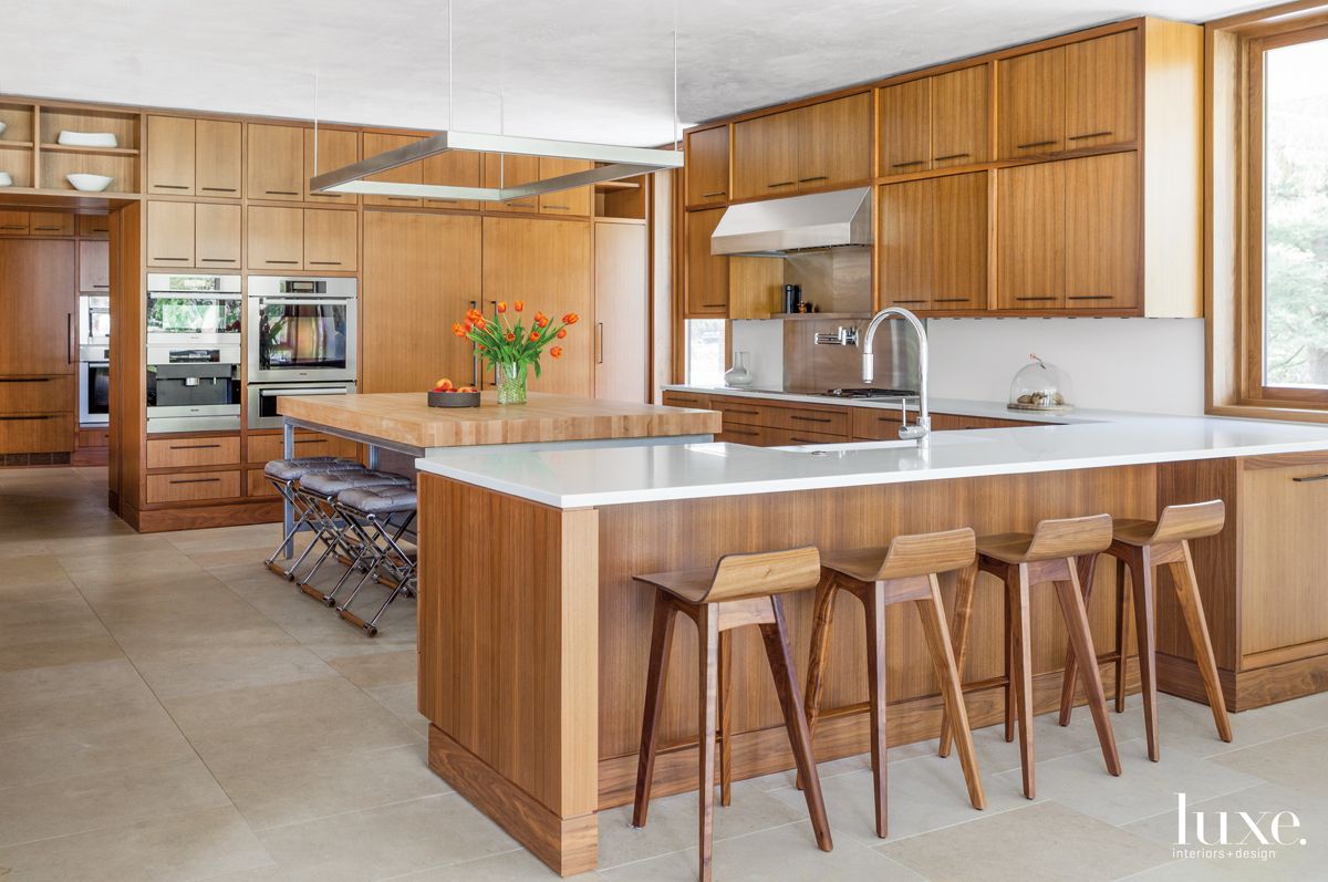 Modern Neutral Kitchen with Ample Seating Space - Luxe Interiors + Design