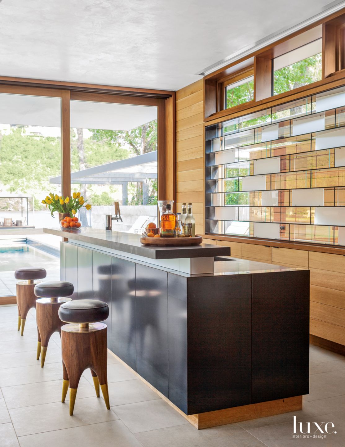Modern Neutral Game Room with Glass-and-Steel Screen - Luxe Interiors ...