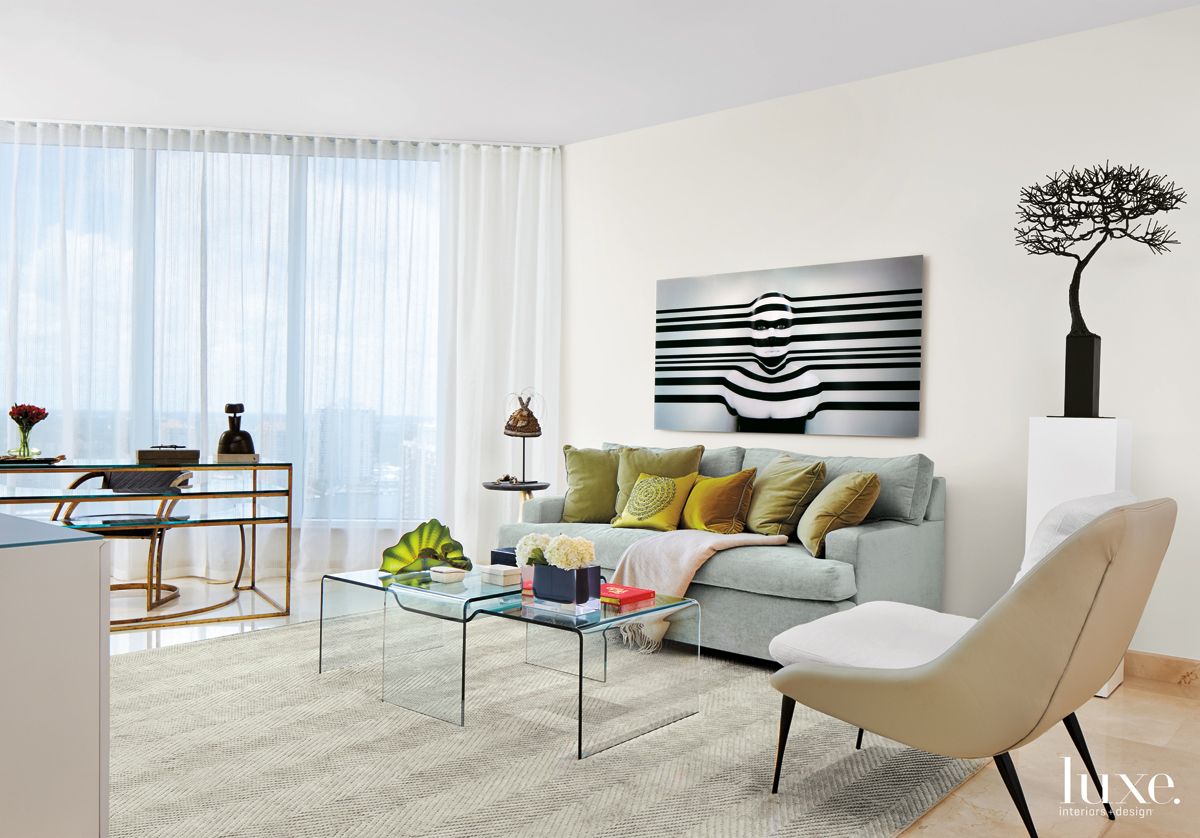 Contemporary Cream Den with Striped Artwork - Luxe Interiors + Design