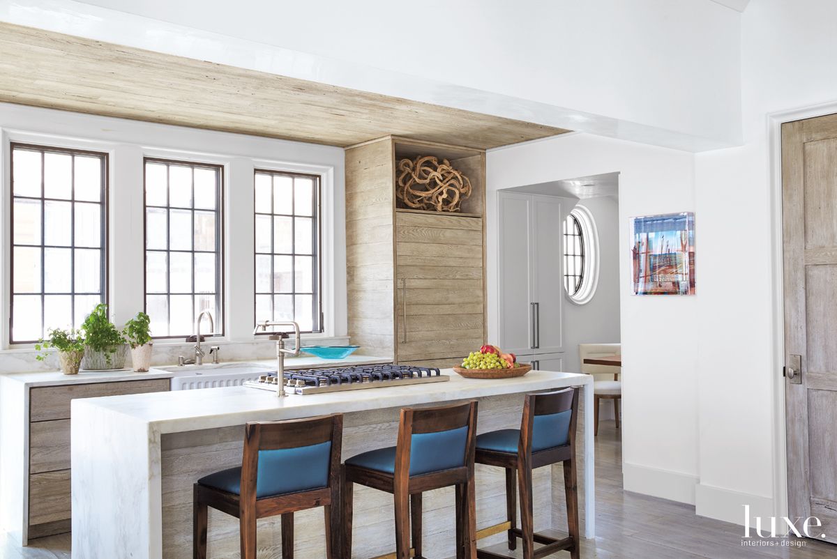 Modern Neutral Kitchen with Wood-Clad Refrigerator - Luxe Interiors ...