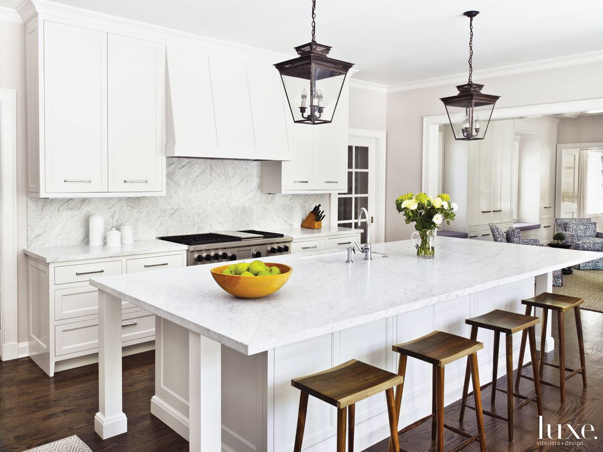 Modern White Kitchen with Hanging Lanterns - Luxe Interiors + Design