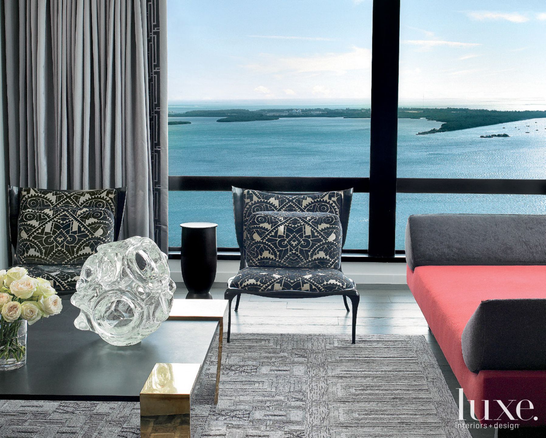 Gray Modern Living Room with Cast-Bronze Chairs - Luxe Interiors + Design