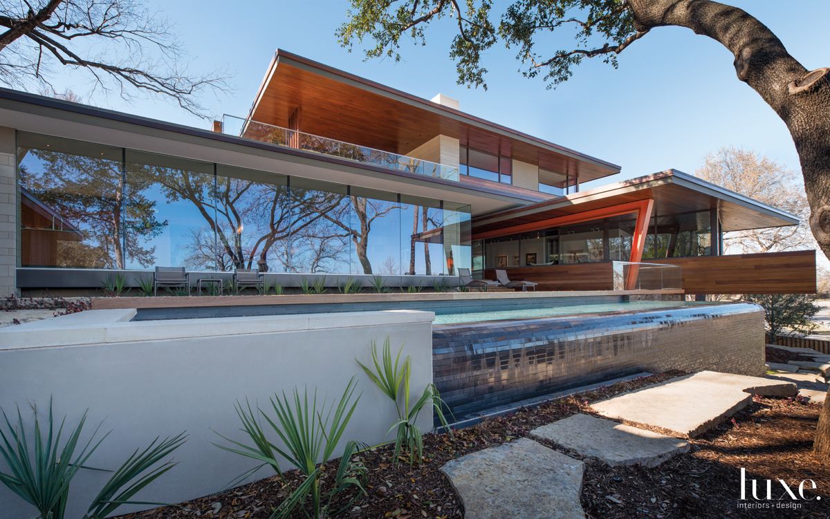 Modern Neutral Exterior with Curved-Edge Pool - Luxe Interiors + Design