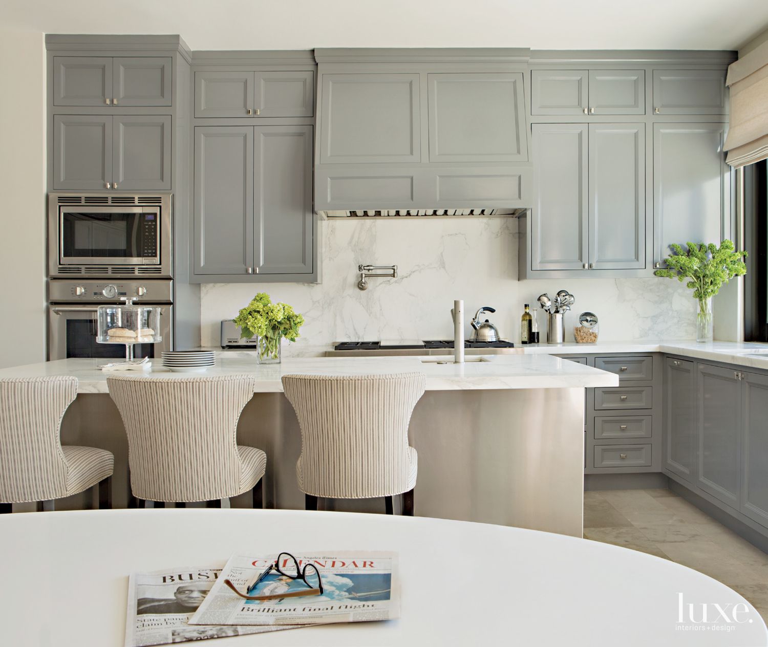 Contemporary Kitchen With Paneled Cabinetry - Luxe Interiors + Design