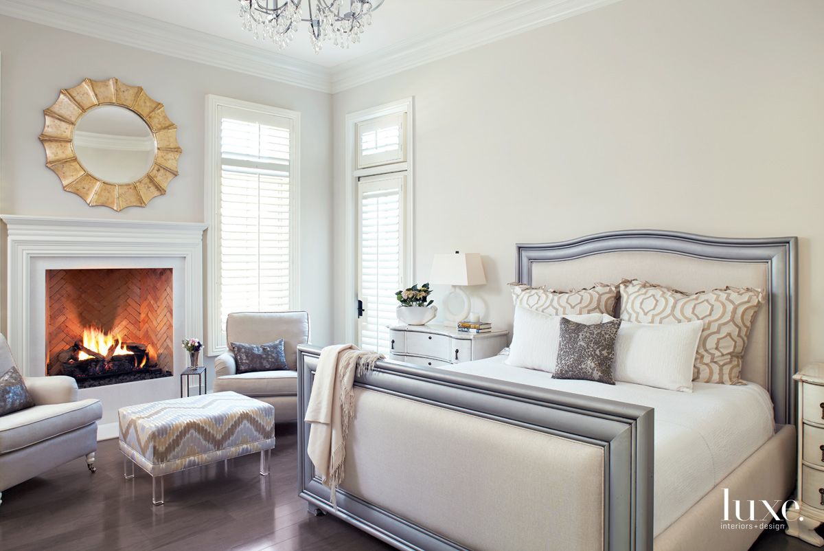 Traditional Cream Master Bedroom with Fireplace - Luxe Interiors + Design