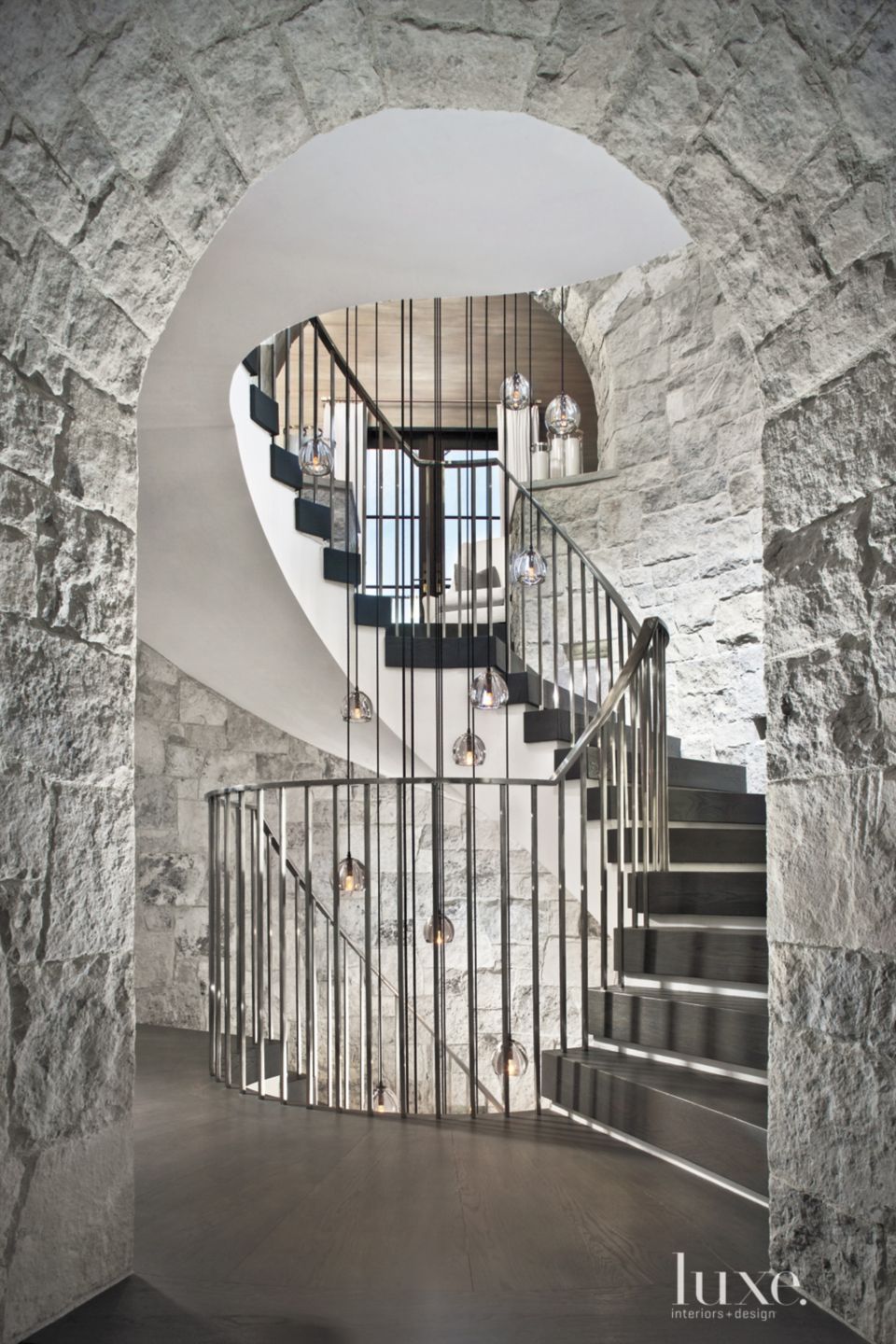 Traditional Stone Spiral Stair Tower - Luxe Interiors + Design