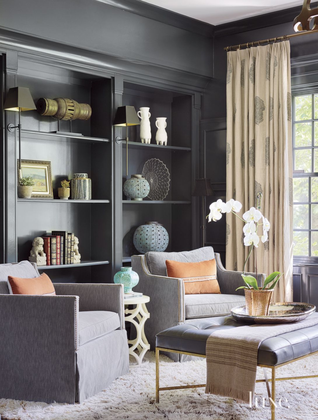 Contemporary Black Library Seating Area - Luxe Interiors + Design