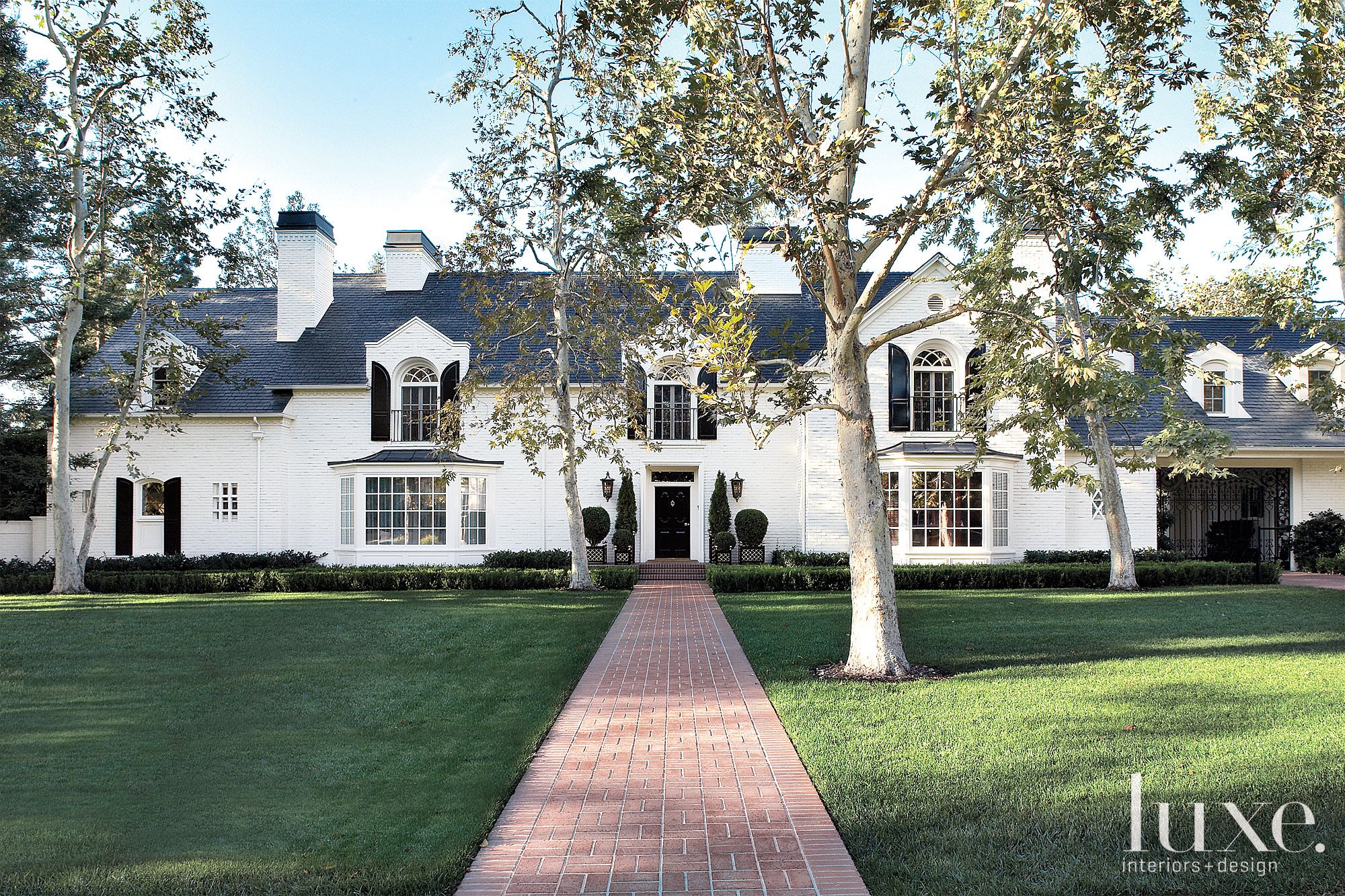 Transitional White Front Elevation with Bay Windows - Luxe Interiors ...