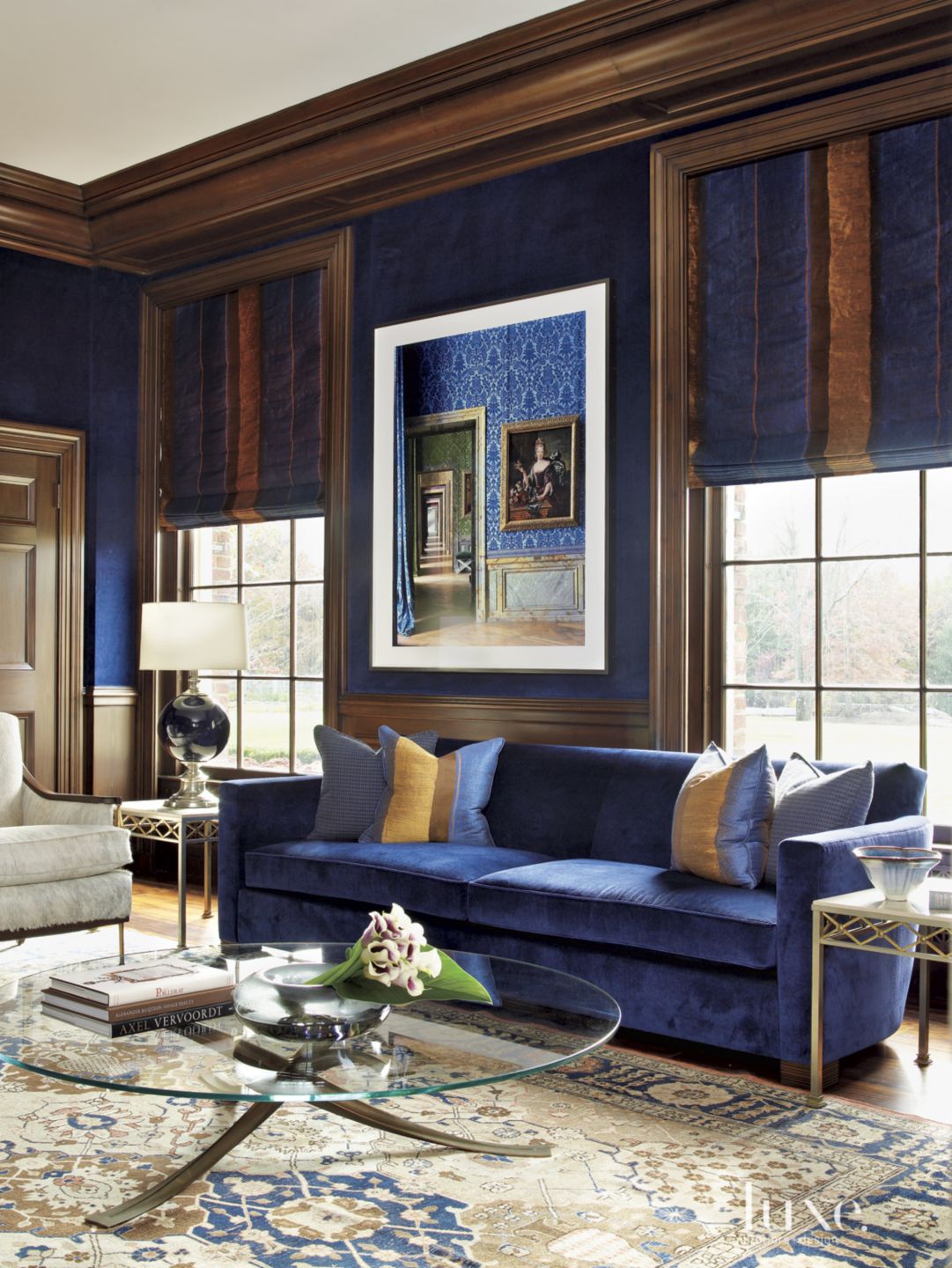 Traditional Blue Library with French Windows - Luxe Interiors + Design