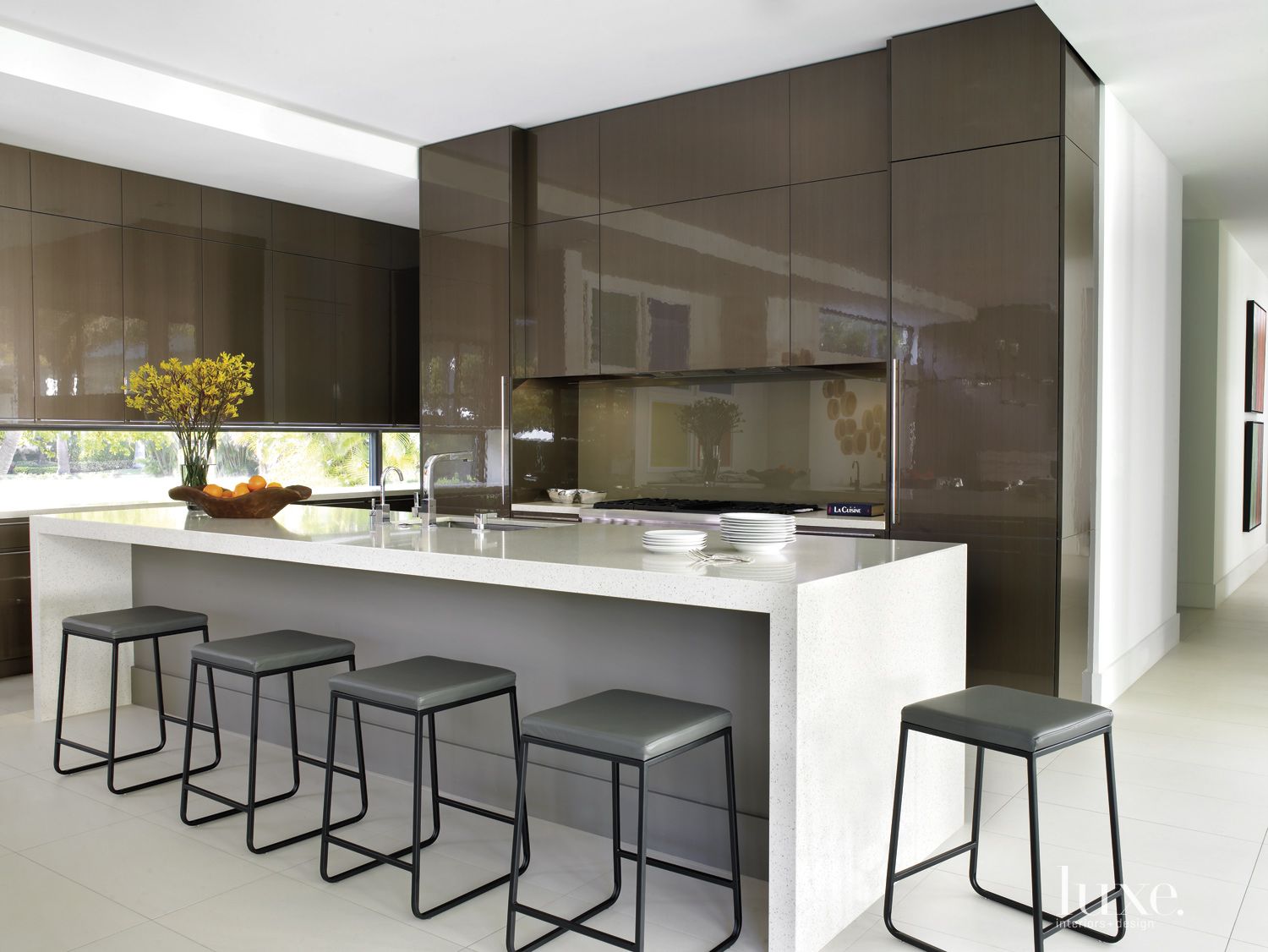 Modern Neutral Kitchen with High Gloss Cabinetry - Luxe Interiors + Design
