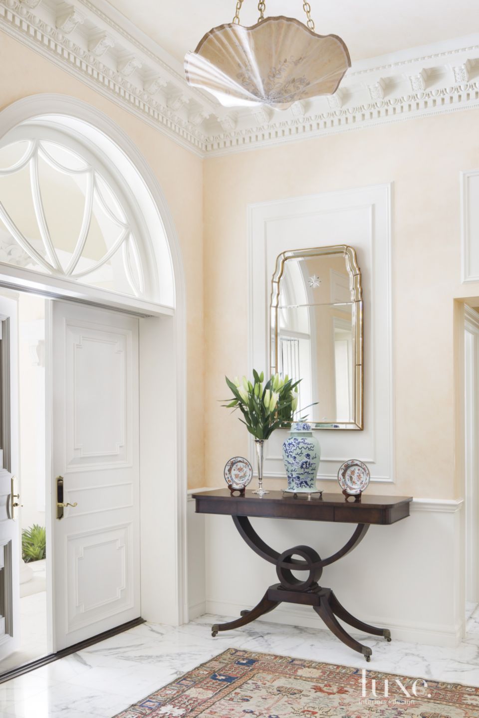 Traditional Cream Foyer with Crown Molding - Luxe Interiors + Design