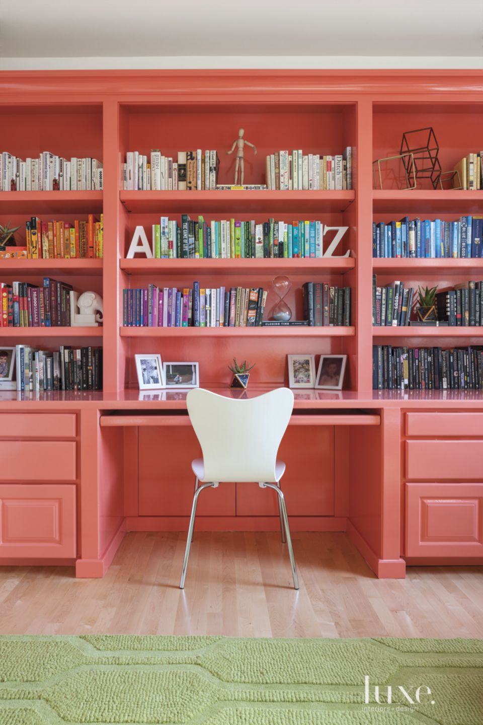 Modern Coral Study with Bookshelves - Luxe Interiors + Design