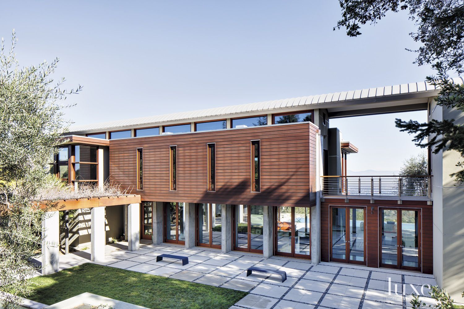Contemporary Mahogany-and-Concrete Breezeway - Luxe Interiors + Design