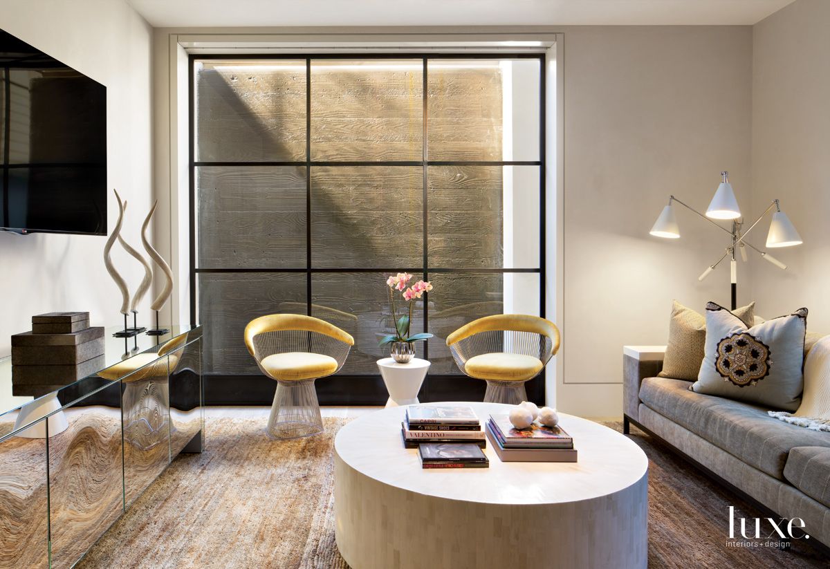 Modern Neutral Game Room with Yellow Armchairs - Luxe Interiors + Design