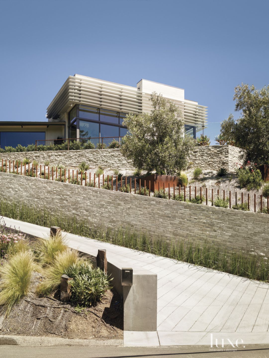 Modern Gray Front Elevation with Aluminum Screen - Luxe Interiors + Design