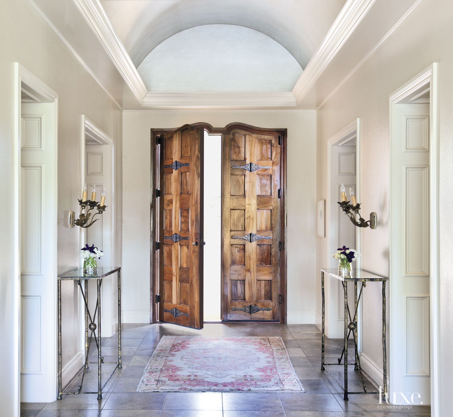 Contemporary Neutral Foyer with Antique Rug - Luxe Interiors + Design