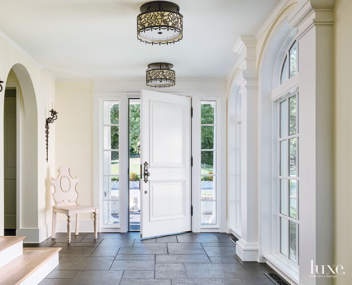 Traditional White Entry with Basalt Stone Flooring - Luxe Interiors ...